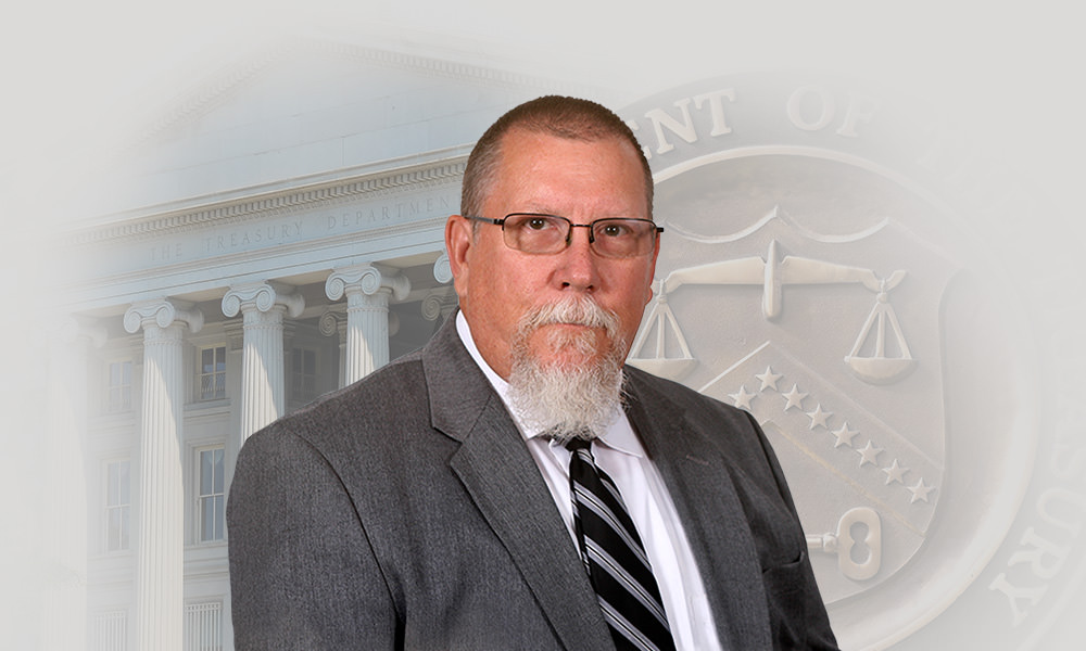 David Motl, Former Acting Principal Deputy Director of the Mint's Hand ...