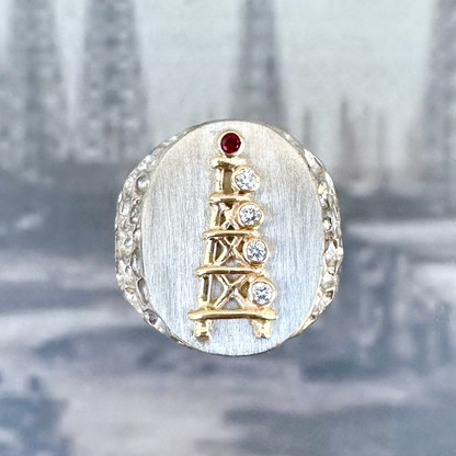OIL DERRICK RING WITH DIAMOND AND RUBY LIGHTS
