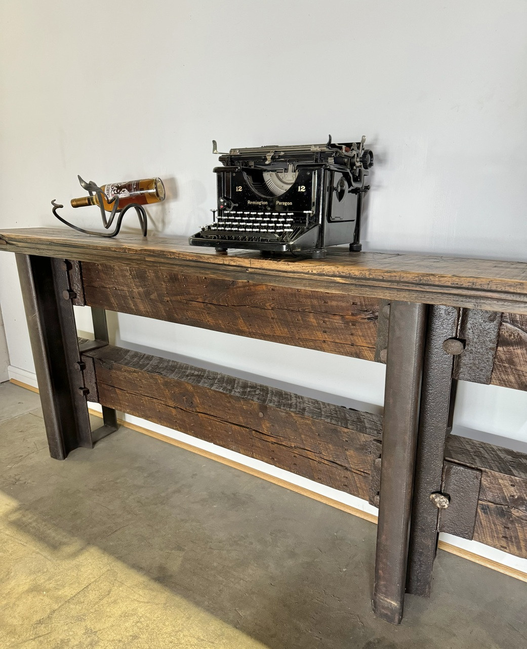 Uniquely worn side table from reclaimed steel wood