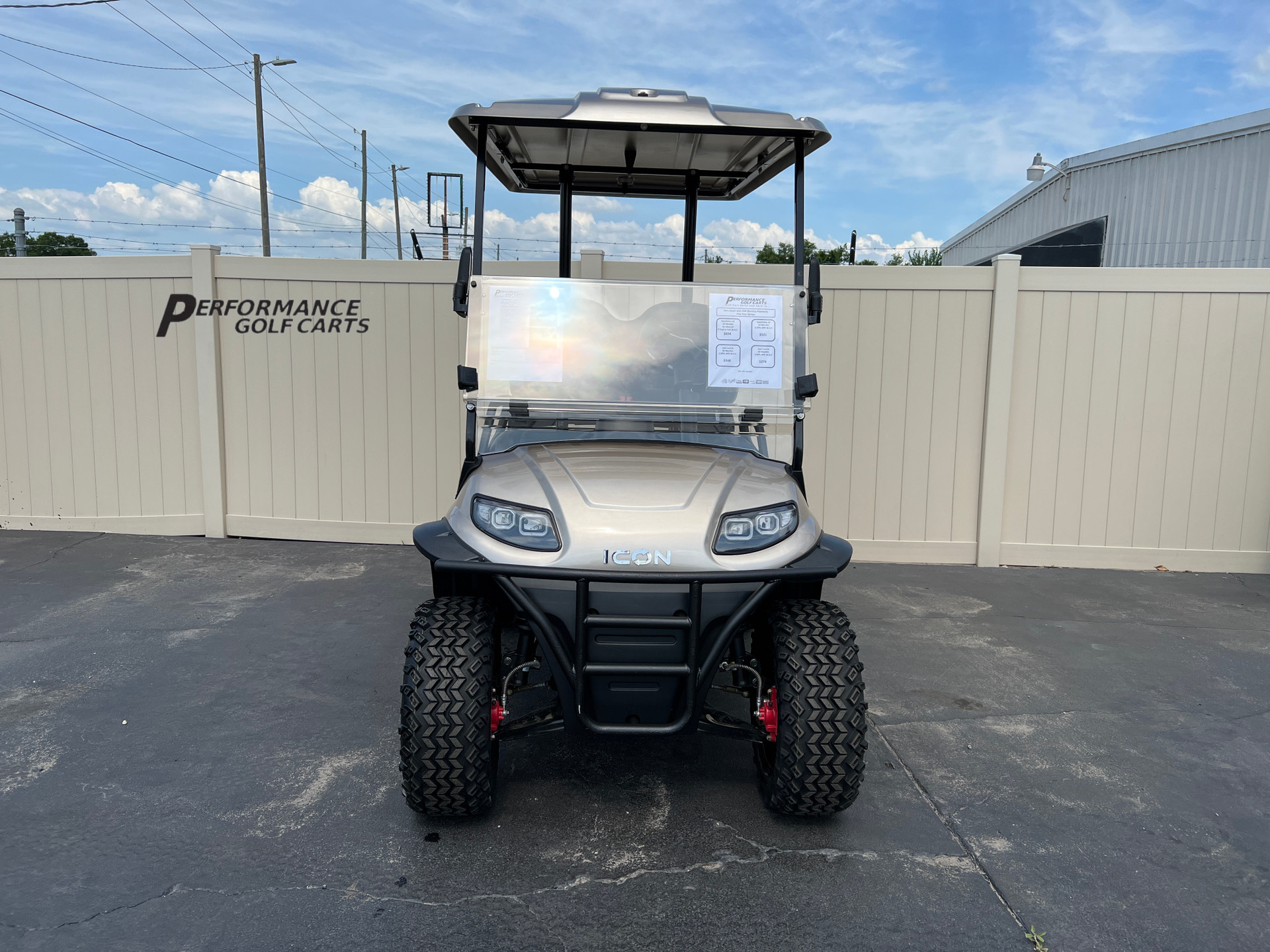 Champagne ICON i40L Custom Lifted Golf Cart - Performance Golf Carts