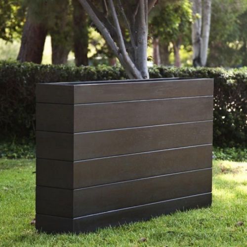 Creating a Tropical Paradise in the Middle of the City - Planters Unlimited