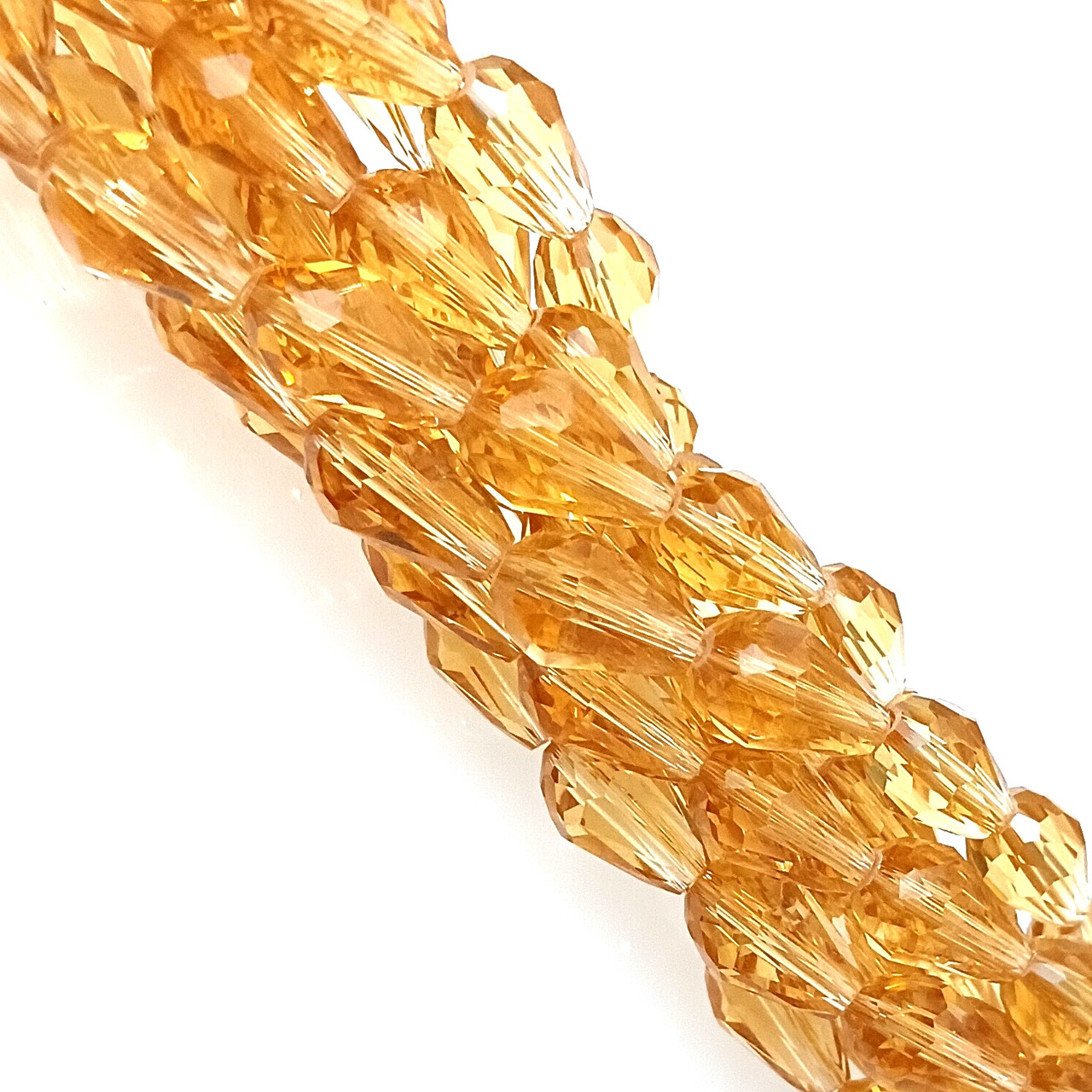 1 Strand of 11x7mm Glass Crystal Teardrops - Light Gold