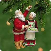 2001 Santa Sneaks A Sweet Hallmark Ornament | The Ornament Shop