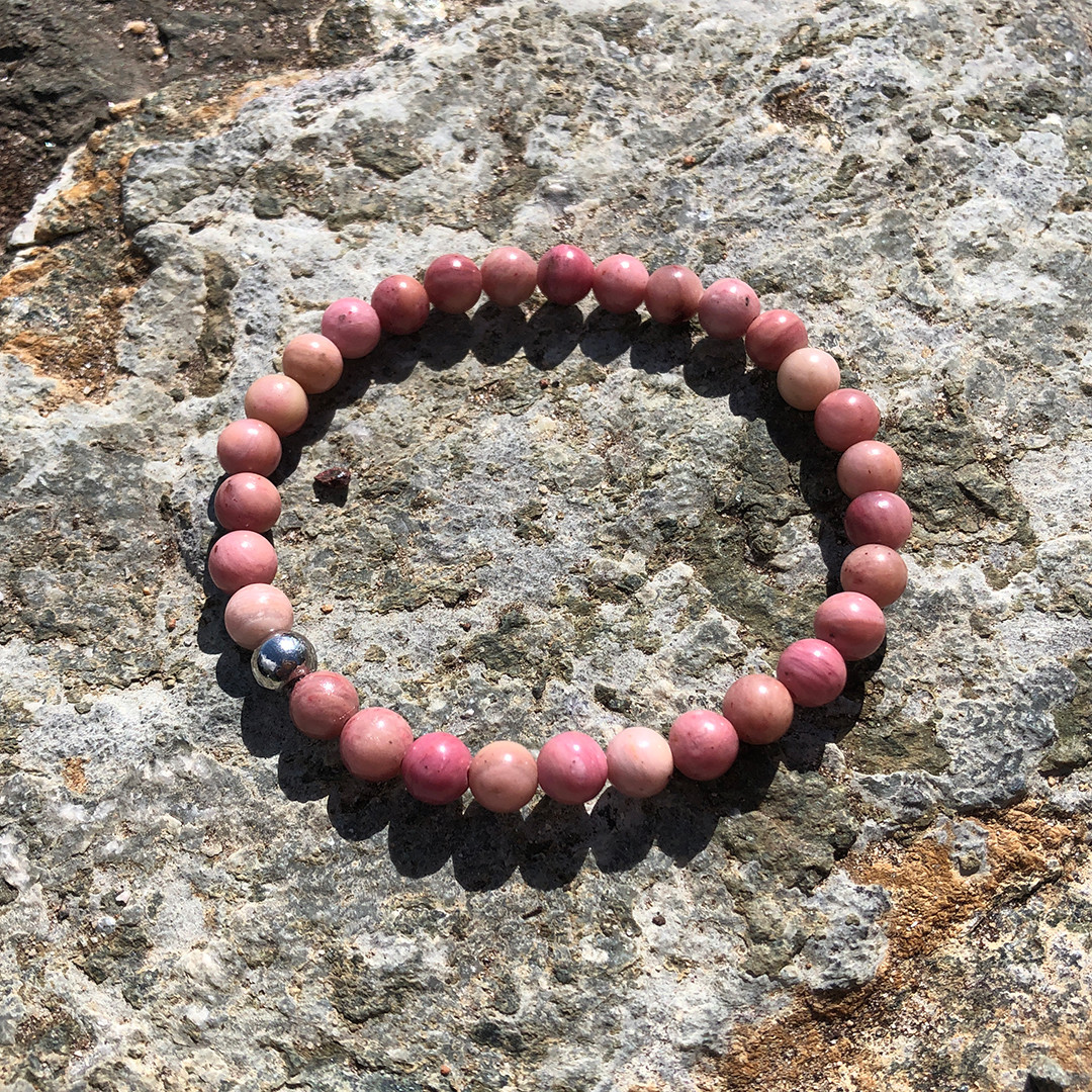 Rhodonite Crystal Meaning, Attributes and Healing Properties