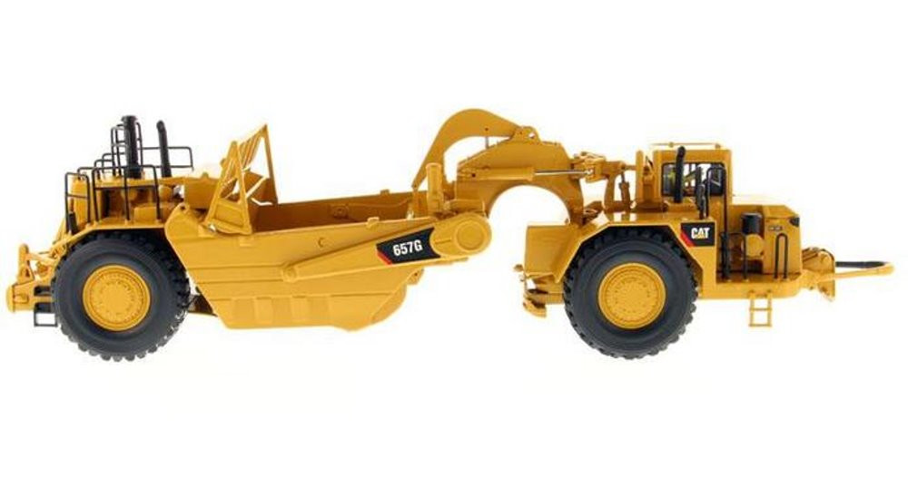 Caterpillar 657 G Wheel Tractor Scraper with Operator, Yellow - Diecast ...