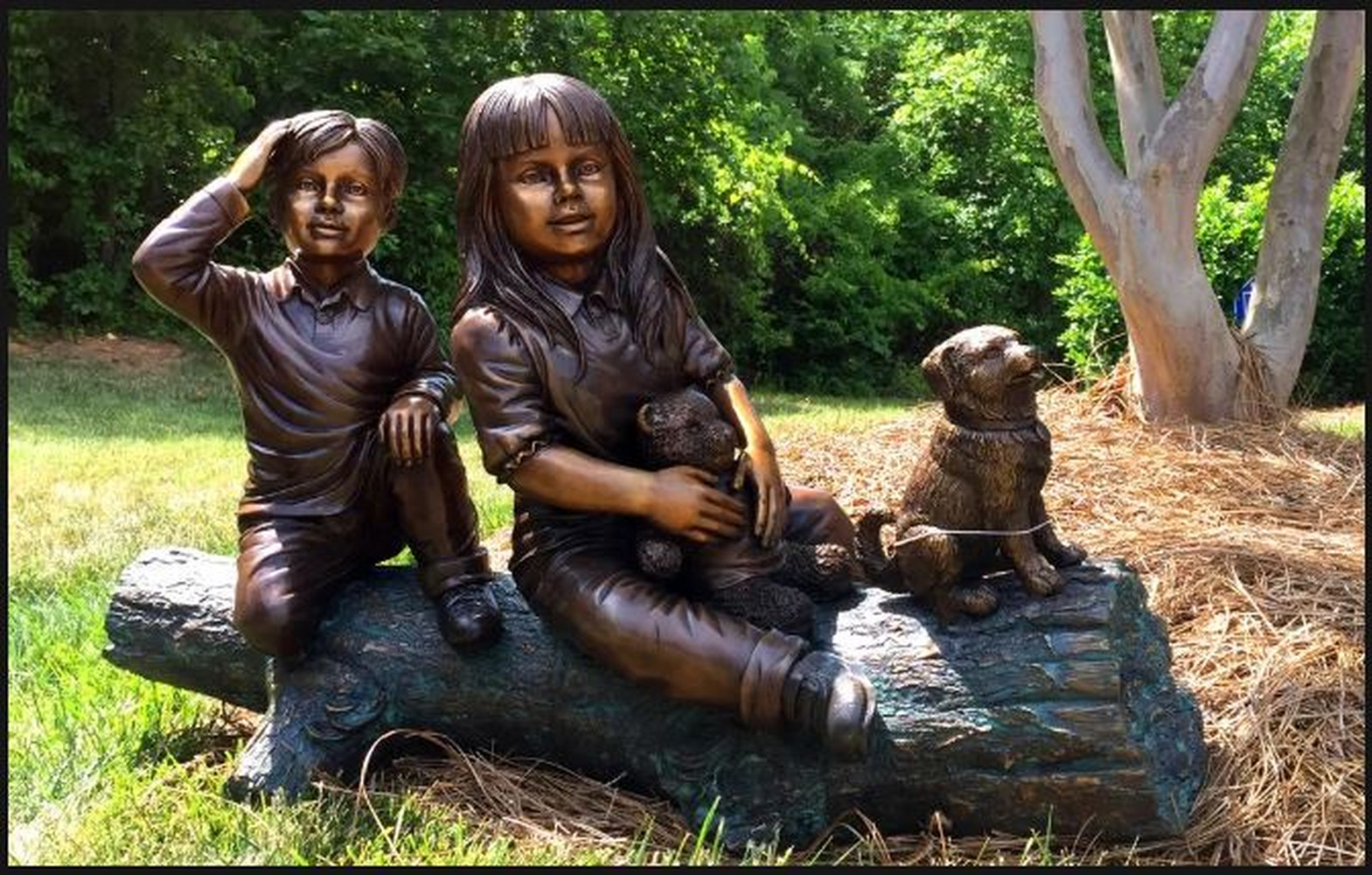 Bronze Boy and Girl Reading on Tree Log Sculpture - DaVinci Emporium