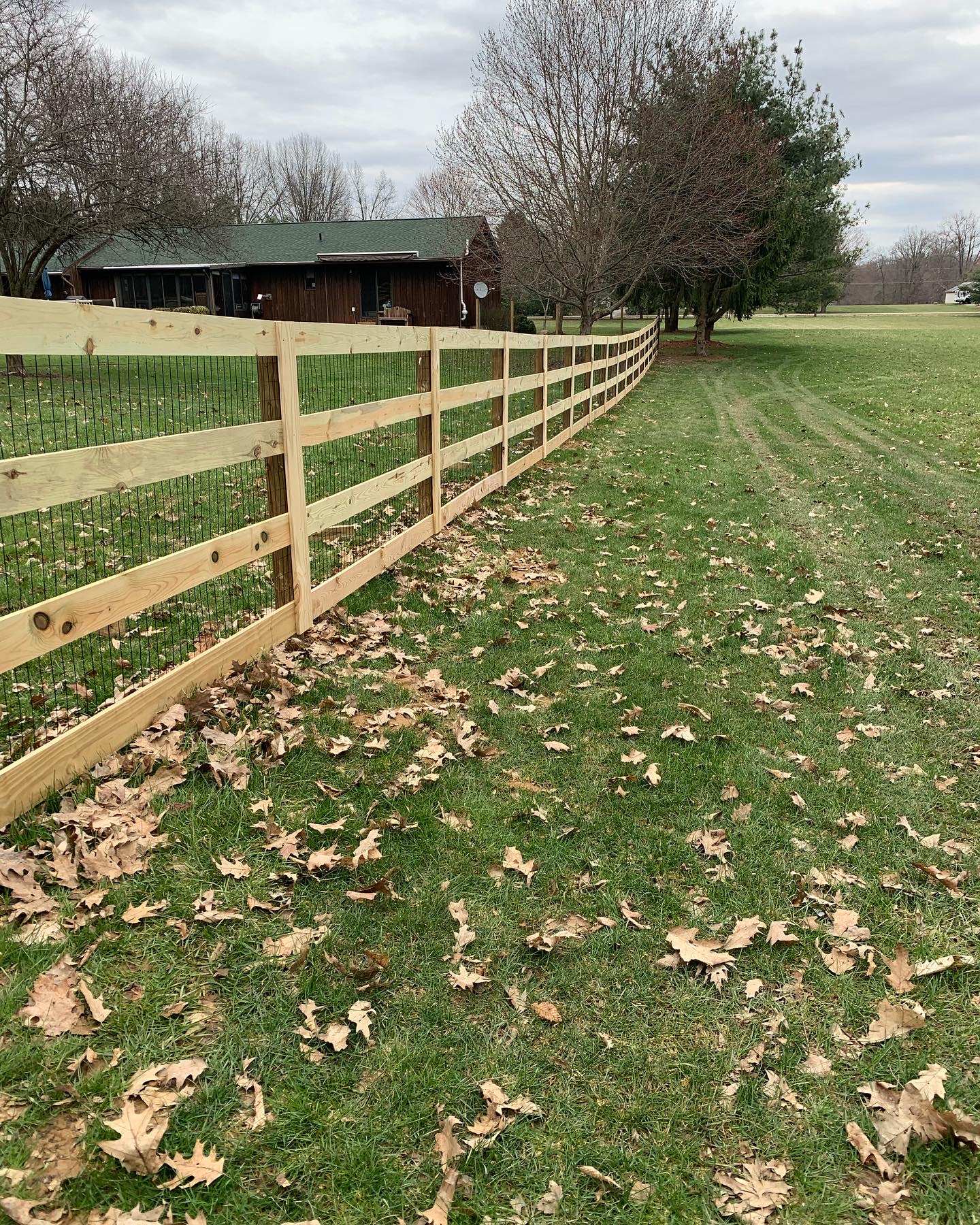 Ed's 2x4 Fence Attached to Wood Posts - Critterfence.com