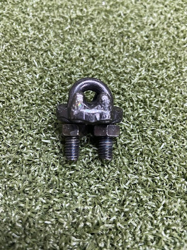 Small zinc coated cable clamp for tension cable