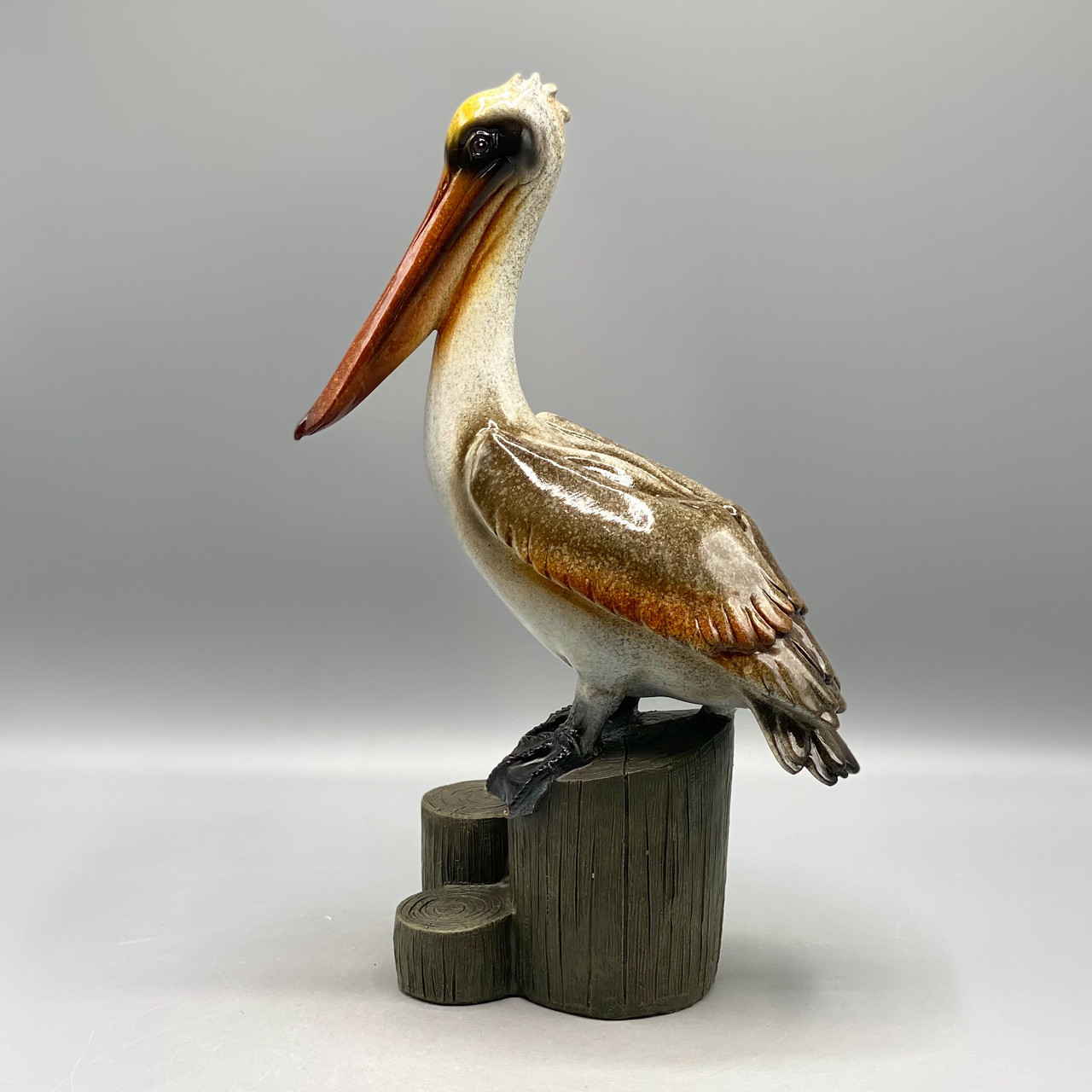 Pelican on Log - Ocean Springs Mercantile