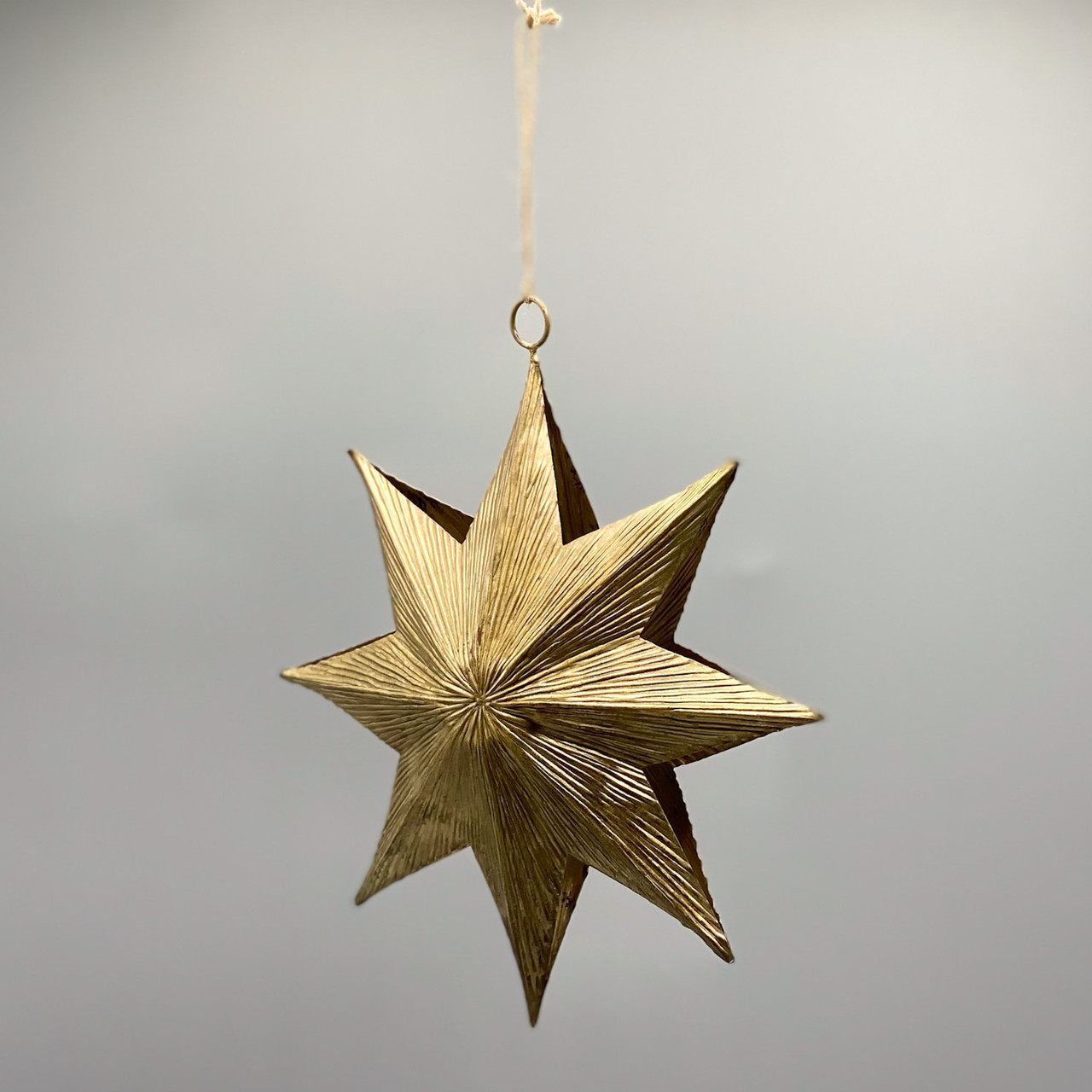 8" Two Sided Embossed Metal Star Ornament - Ocean Springs Mercantile