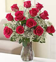 Chappell's Florist - premium dozen red roses/ flower arrangements designed