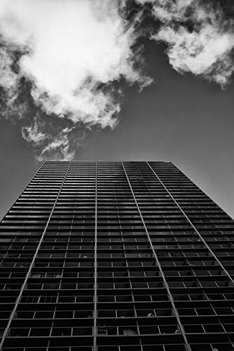 Looking up at a tall building in Waikiki processed in high contrast ...
