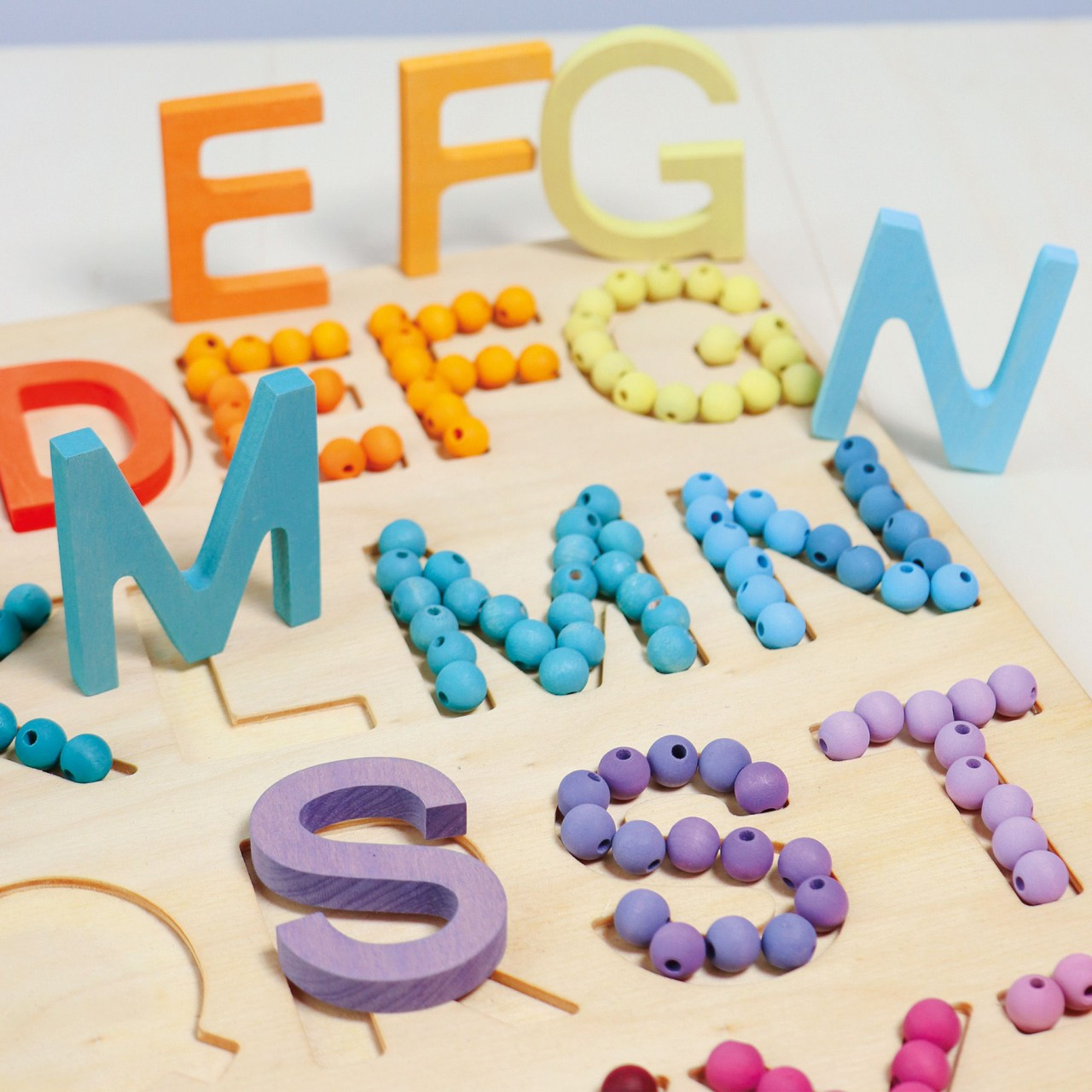 Grimm’s 120 Small Pastel Wooden Beads | Petit Enfant