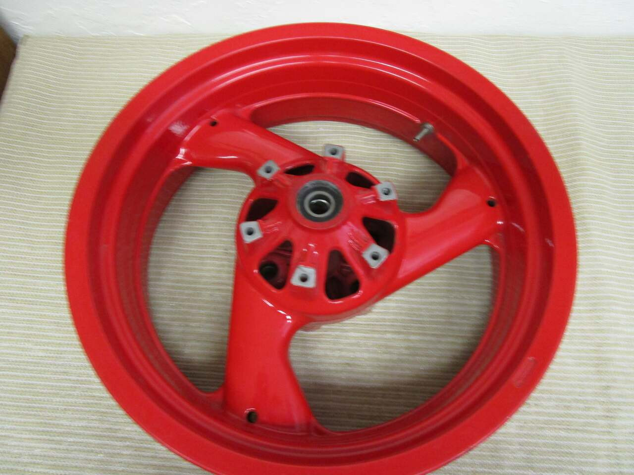Ducati With Red Wheel Band