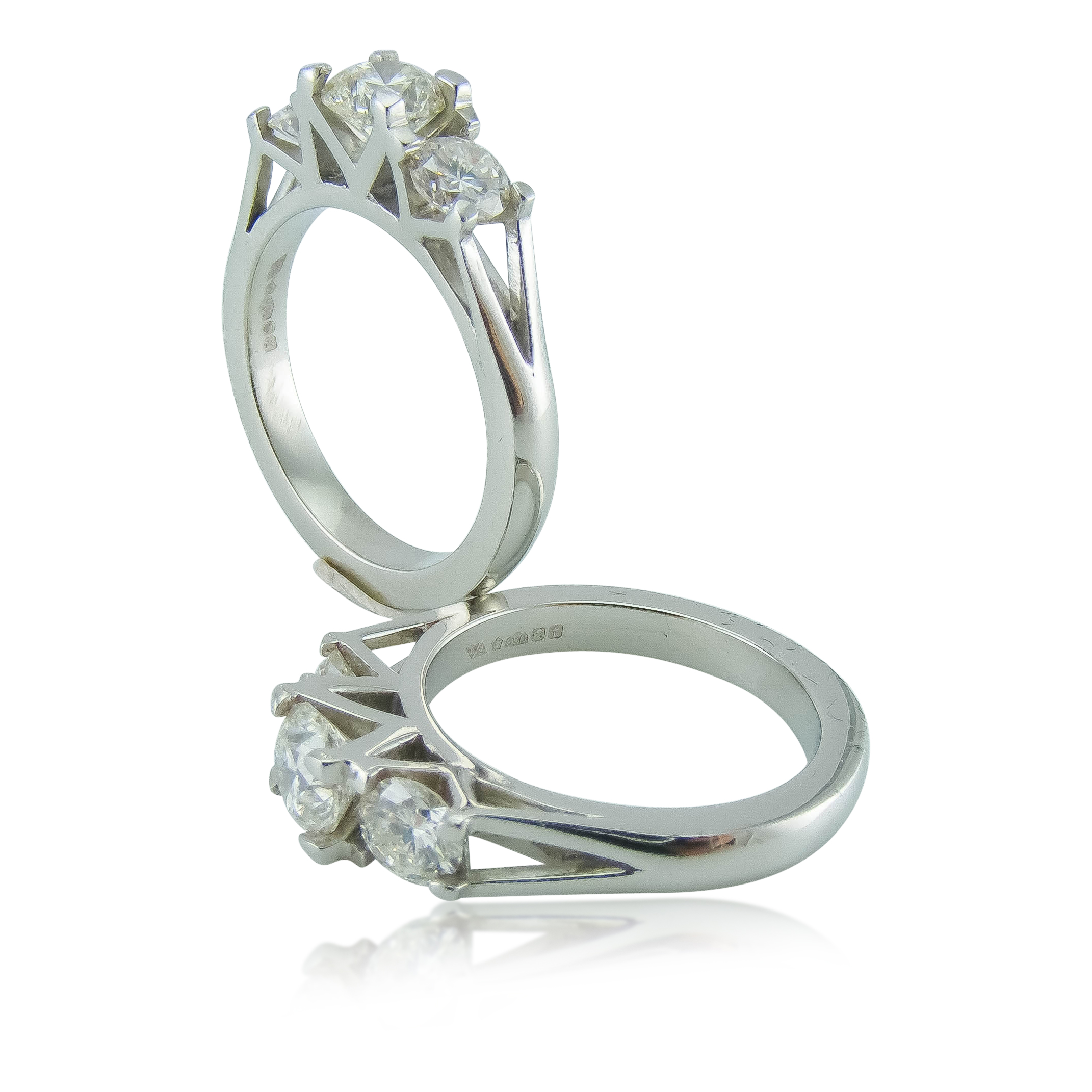 Matching trilogy diamond & platinum engagement rings - Untold Jewellery