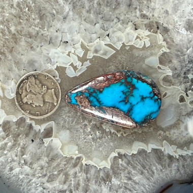 Bisbee Turquoise cab with quartz and red web