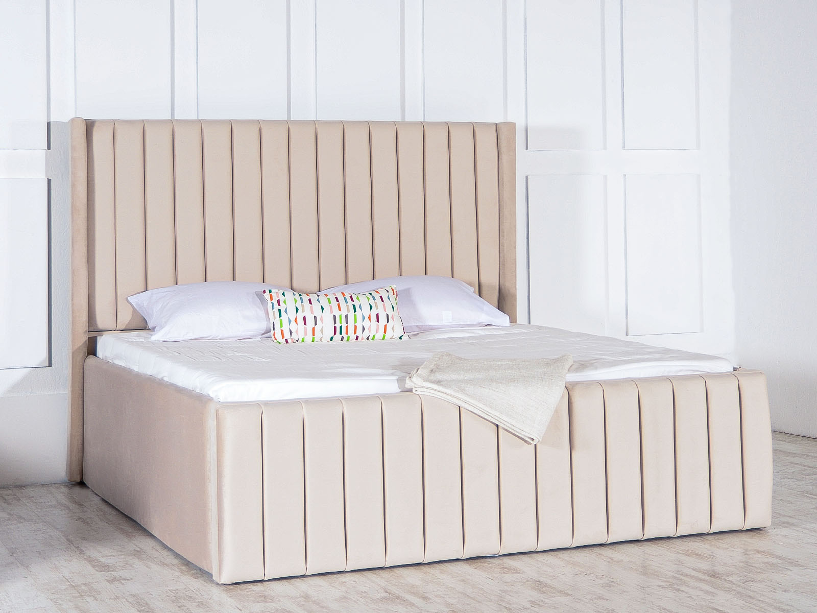 Josephine Gas Lift Ottoman Extra Deep Storage Wing Bed Frame. Available in Smooth Velvet Crush Velvet Chenille Linen Faux Suede Tweed Fabrics