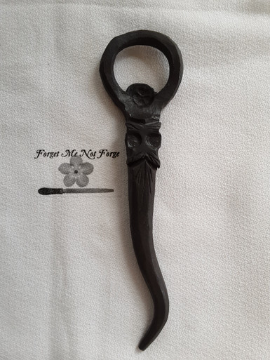 Hand forged wizard bottle opener