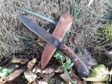 English style trade knife with checkering and dots and curly maple handle