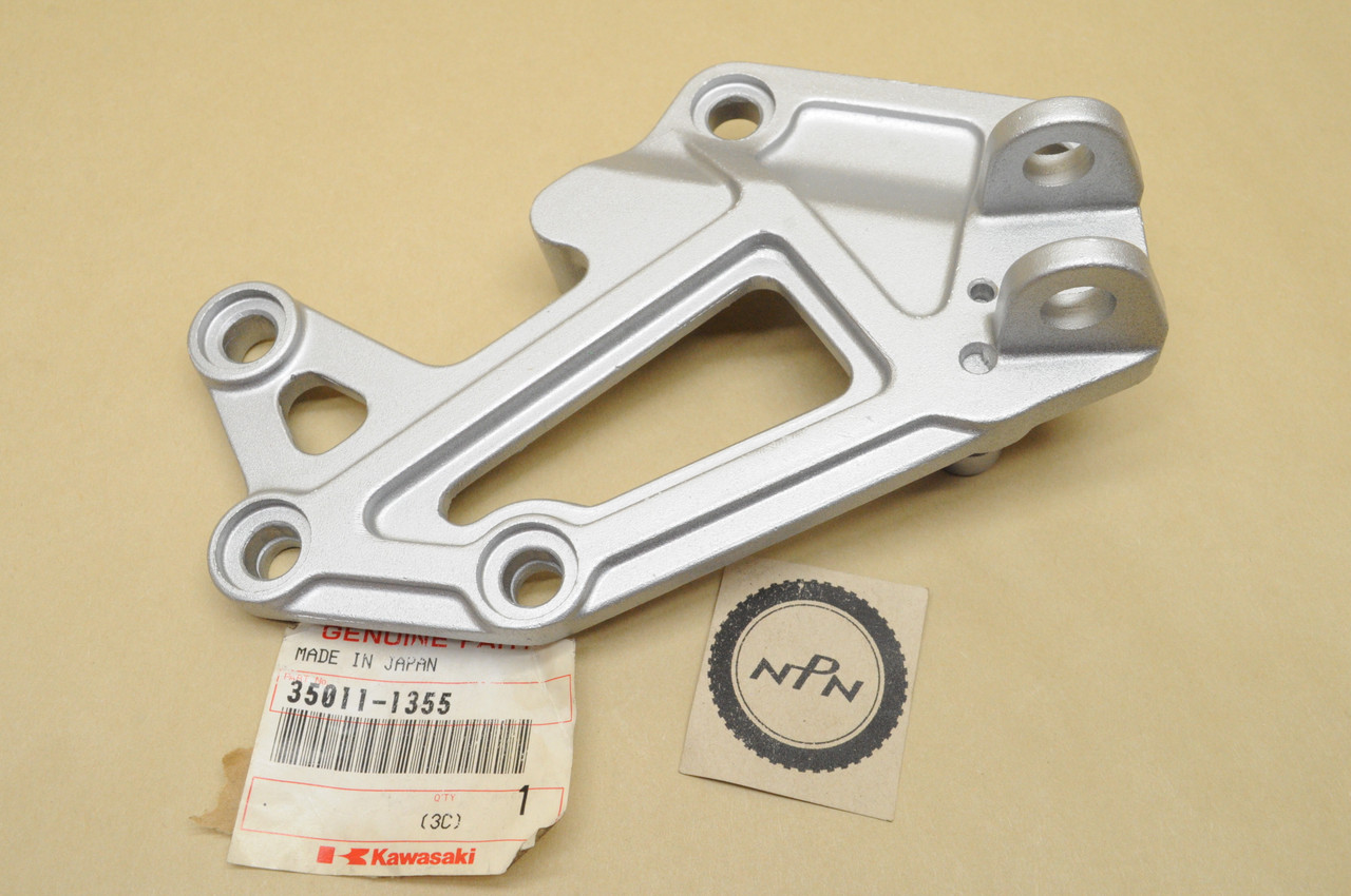 NOS Kawasaki 1988-03 EX250 NINJA Right Front Foot Rest Peg Stay Bracket ...