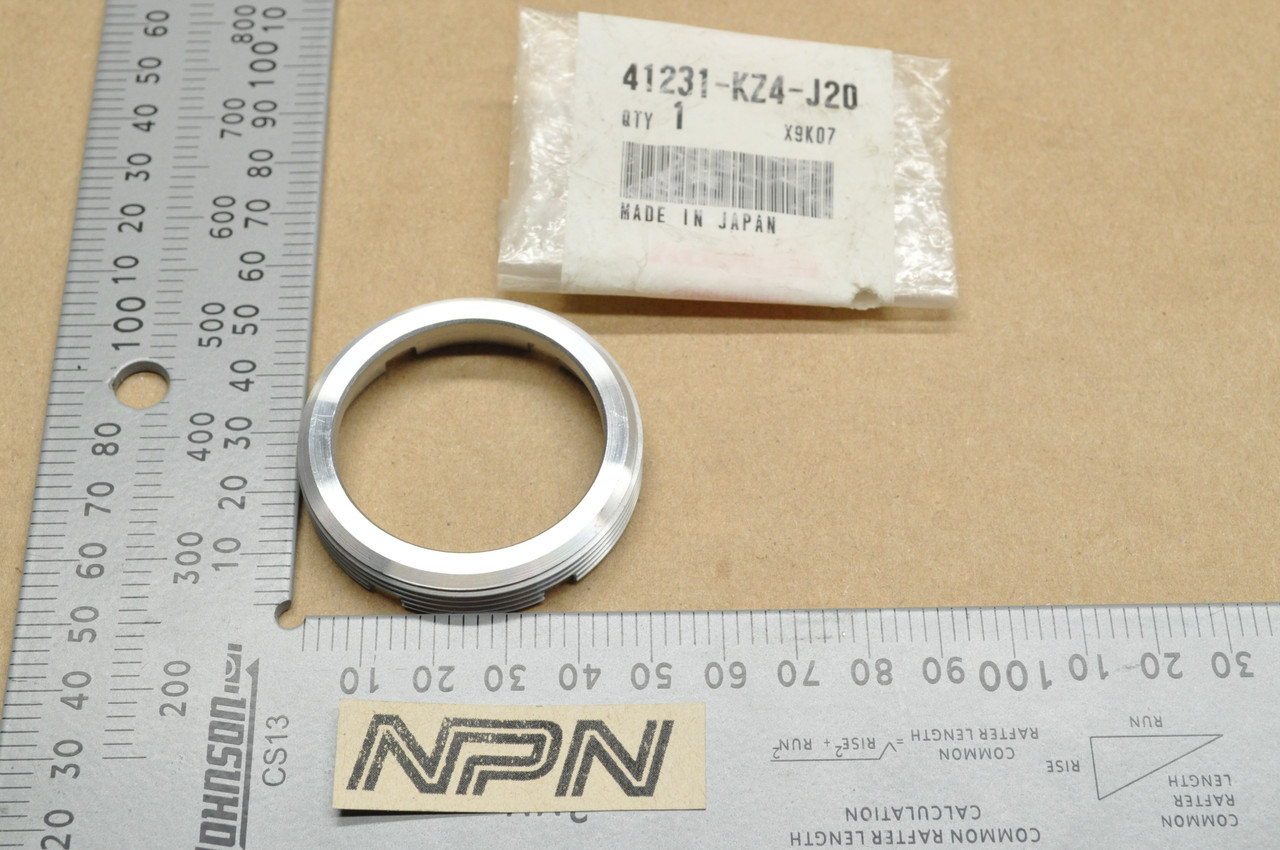 NEW OEM Honda CR125 R CR250 R CRF250 CRF450 Wheel Bearing Retainer ...