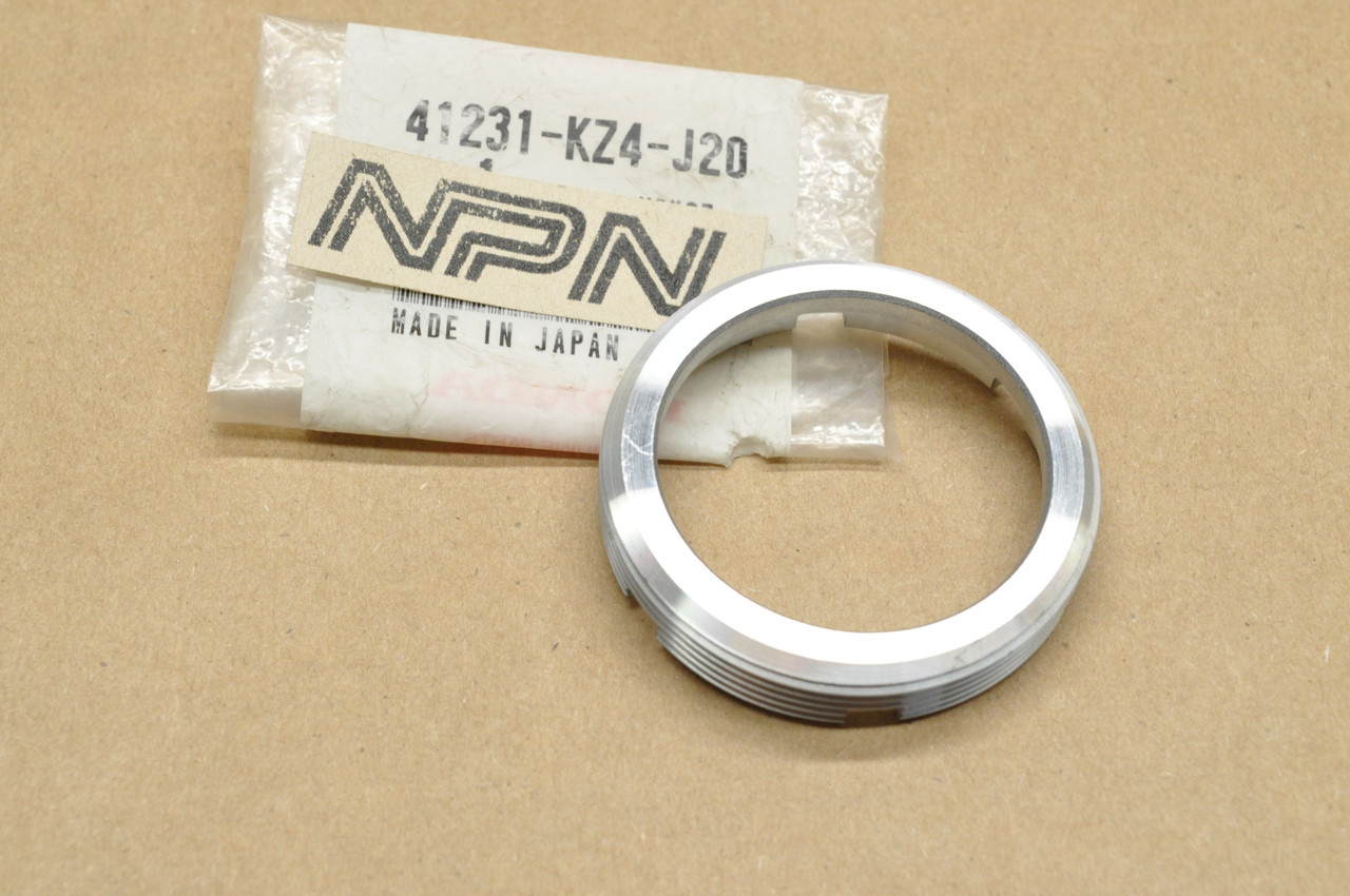 NEW OEM Honda CR125 R CR250 R CRF250 CRF450 Wheel Bearing Retainer ...