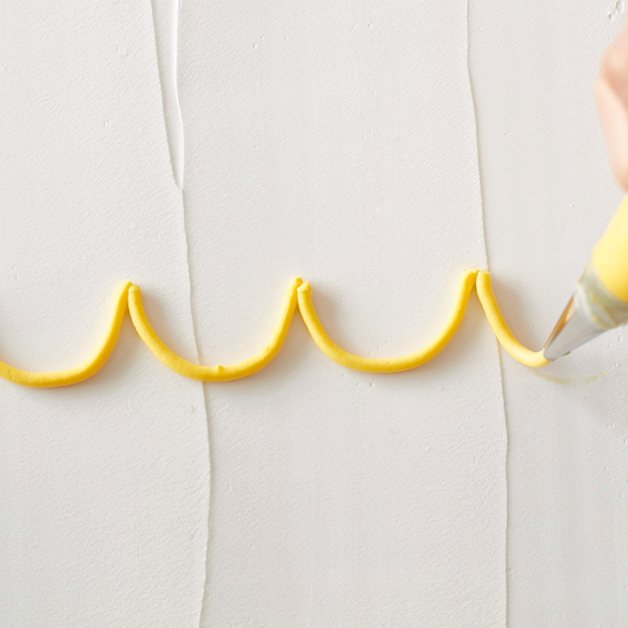 How to Pipe Drop Strings - Wilton