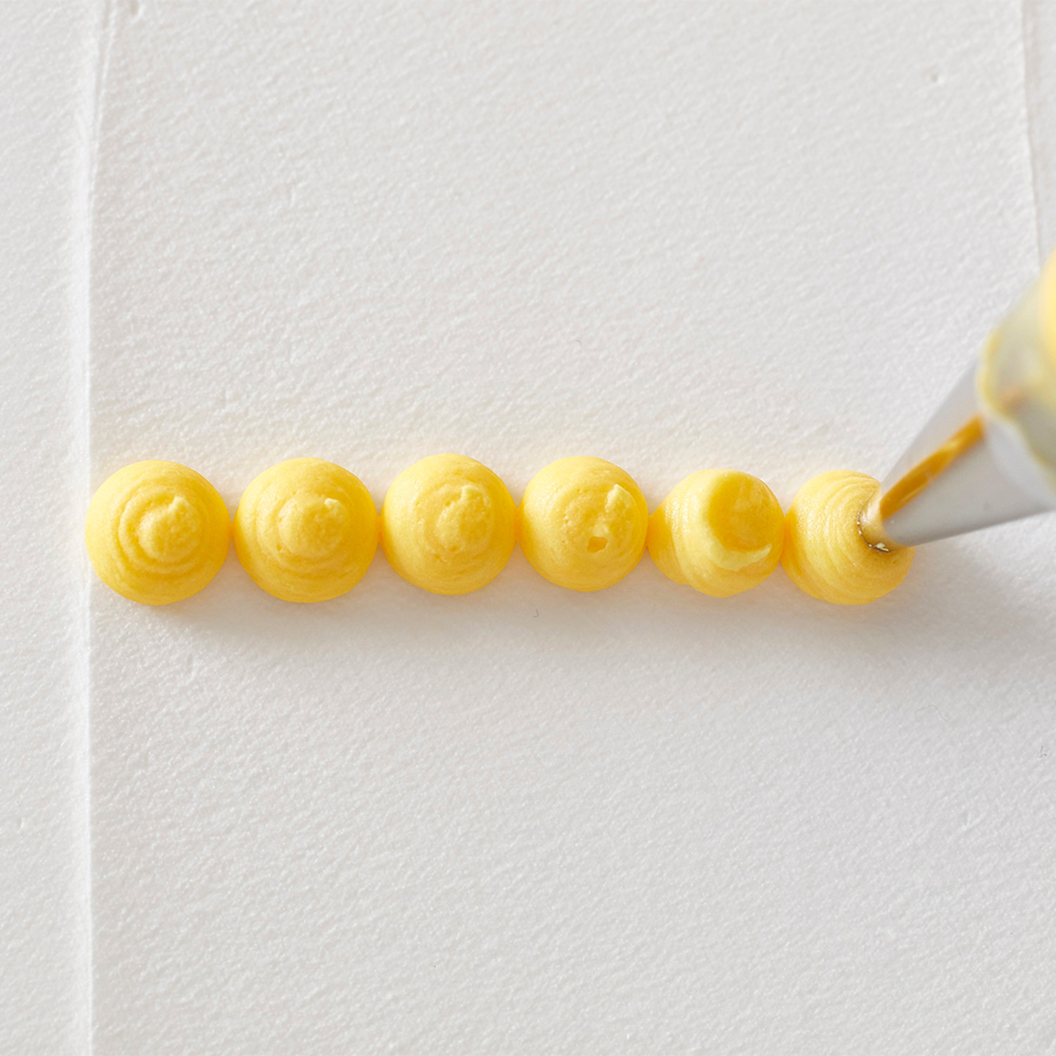 How to Pipe Dots - Wilton