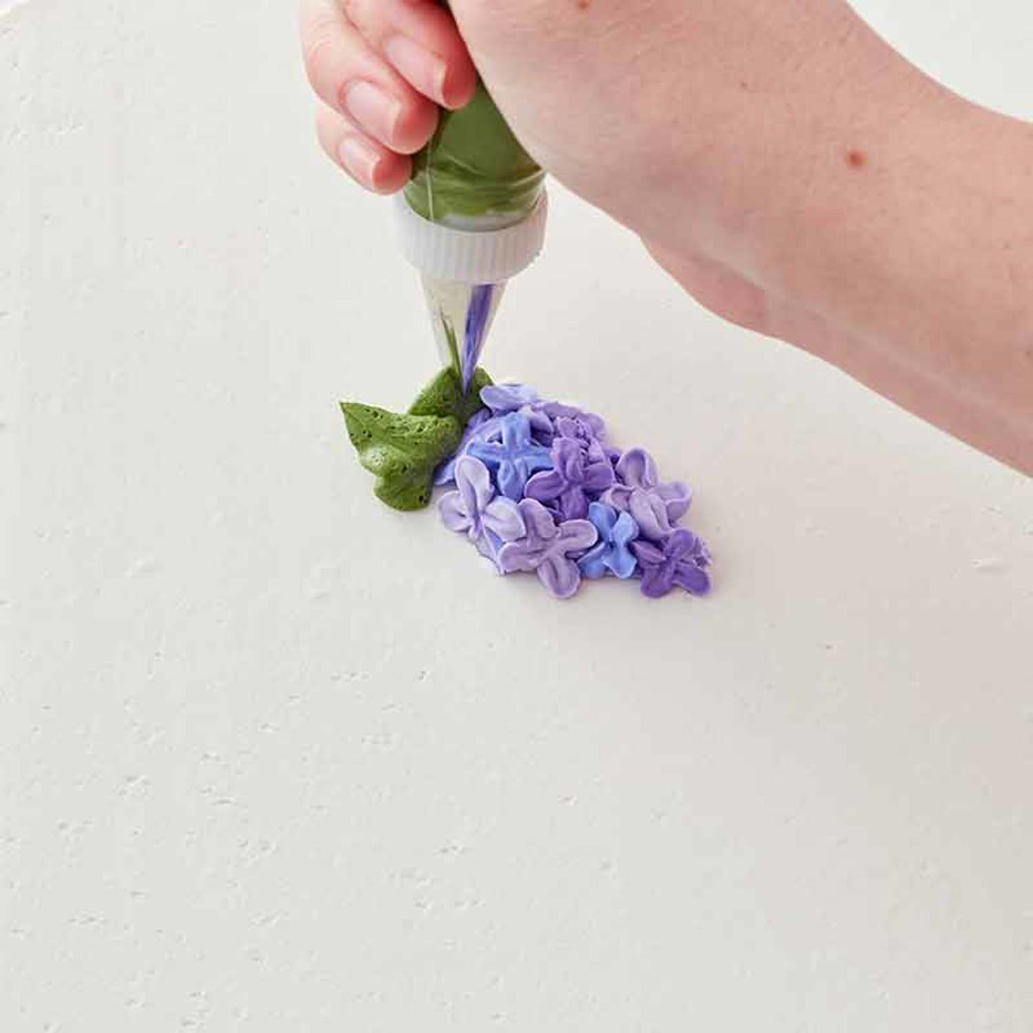 How to Pipe a Lilac Flower - Wilton