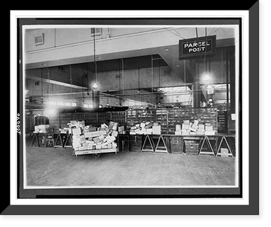 Historic Framed Print, [Parcel post area of mail room showing trucks ...