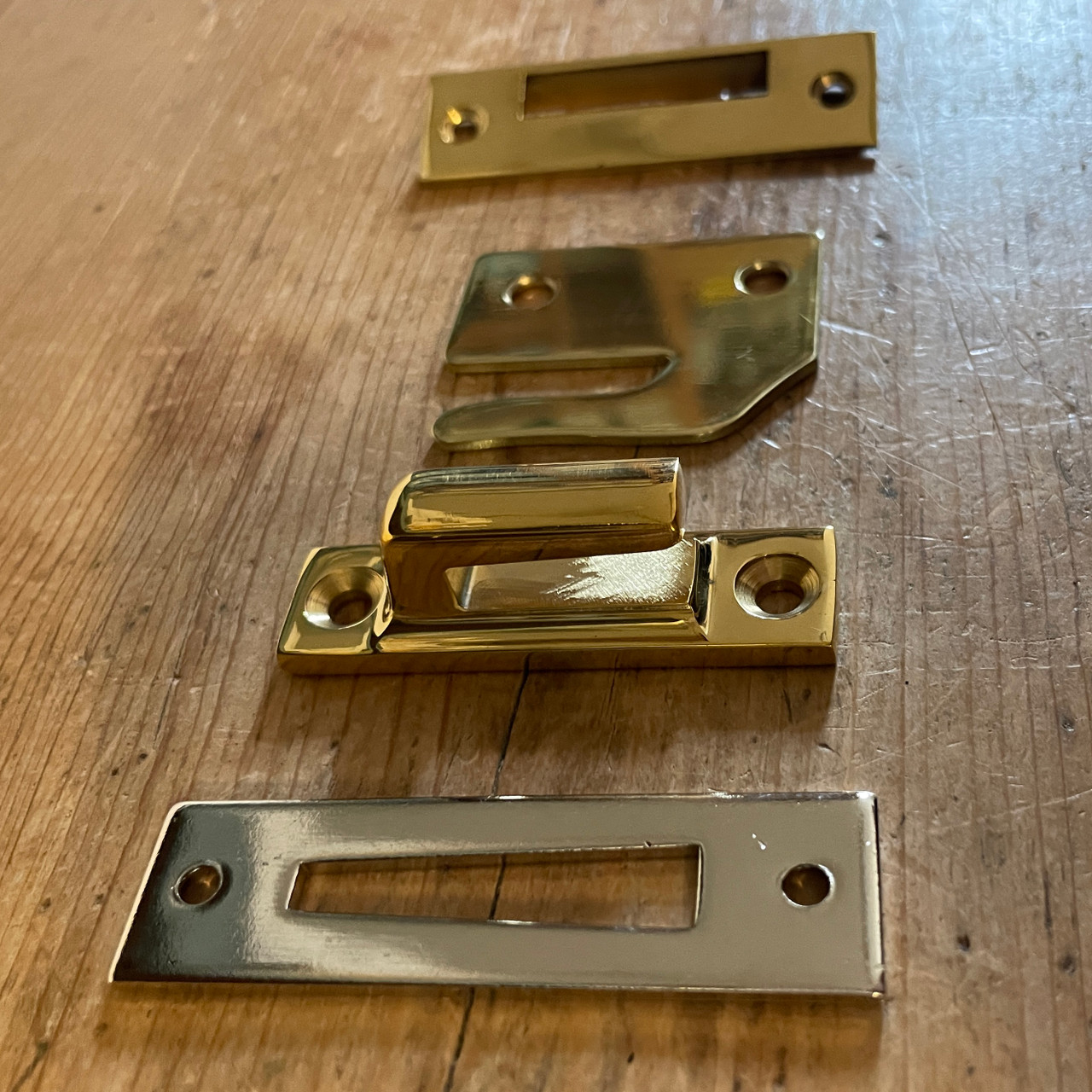 Strike Plates for Casement Fasteners