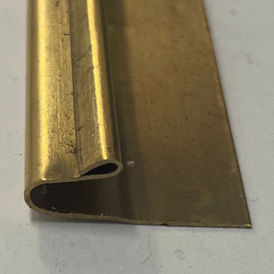 Hook Strip for Use With Interlocking Thresholds