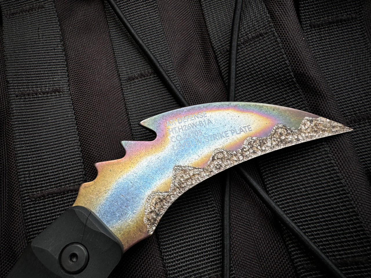 Mick Strider Strike Plate Ti Folder with Black G10 Scales