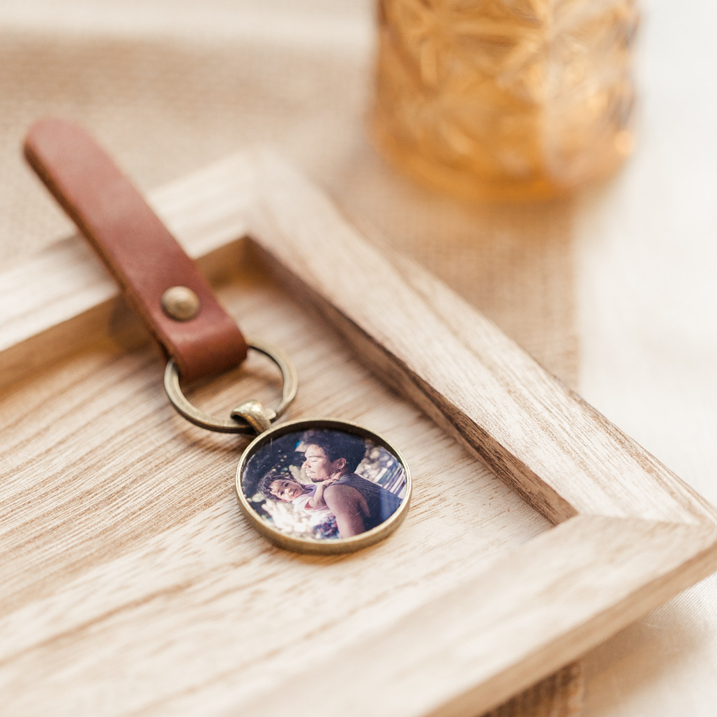 The Henry Locket Keychain is a leather keepsake keychain that holds one ...