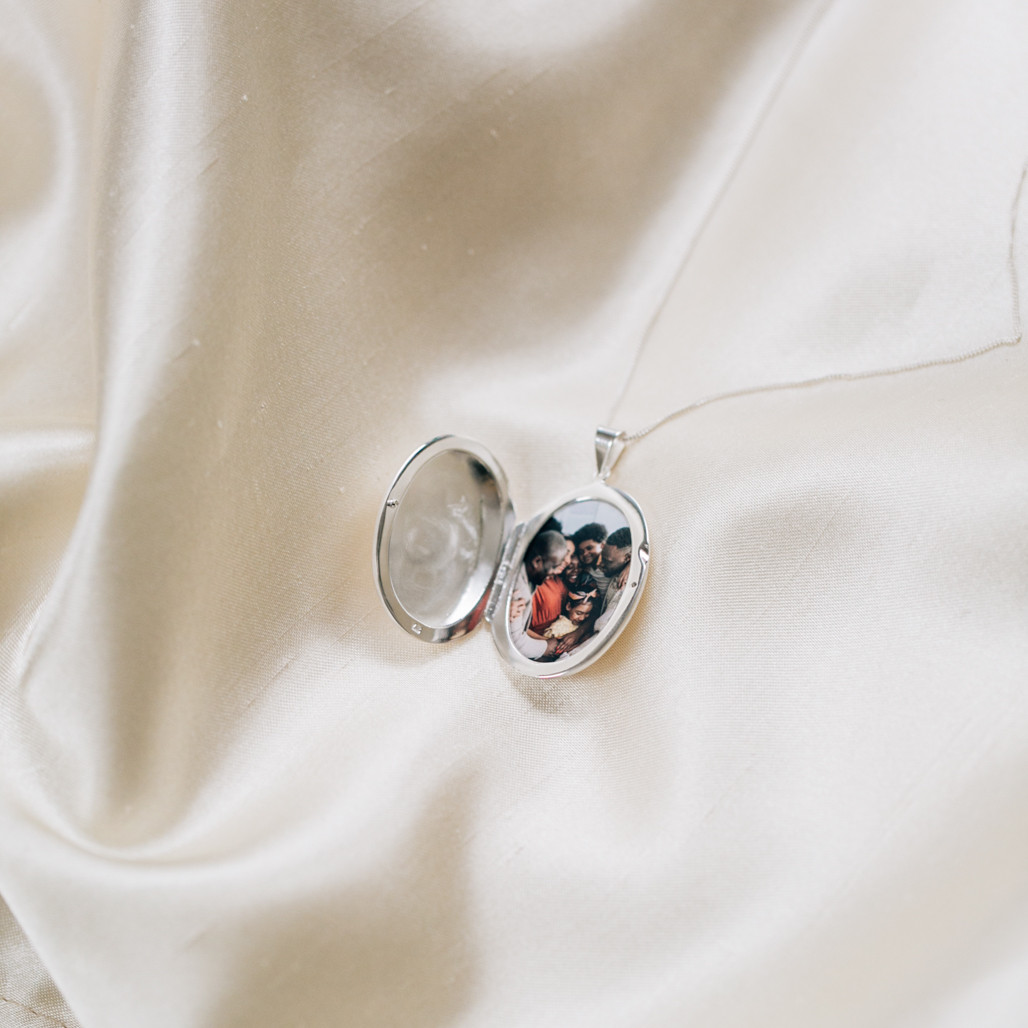 Oval Sterling Silver Locket with etching holds 2 photos inside ...