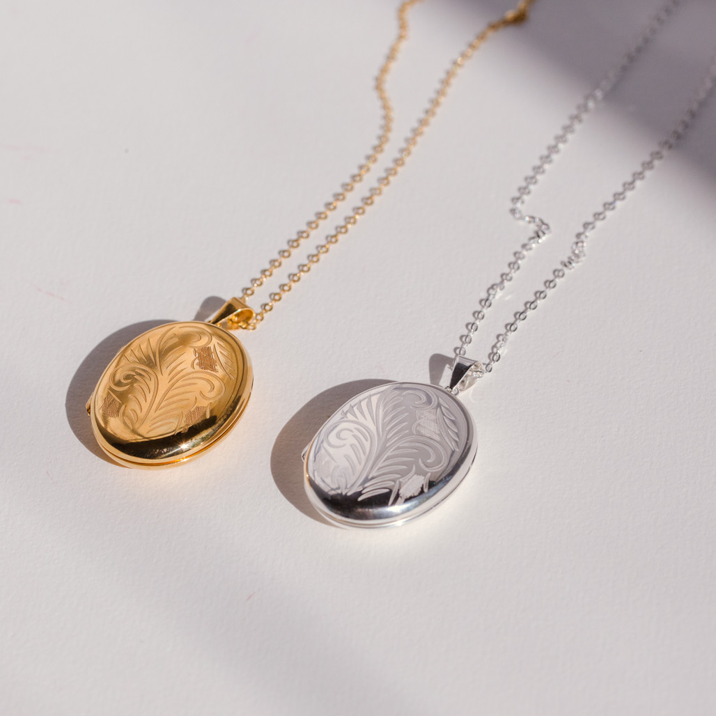Oval Sterling Silver Locket with etching holds 2 photos inside ...