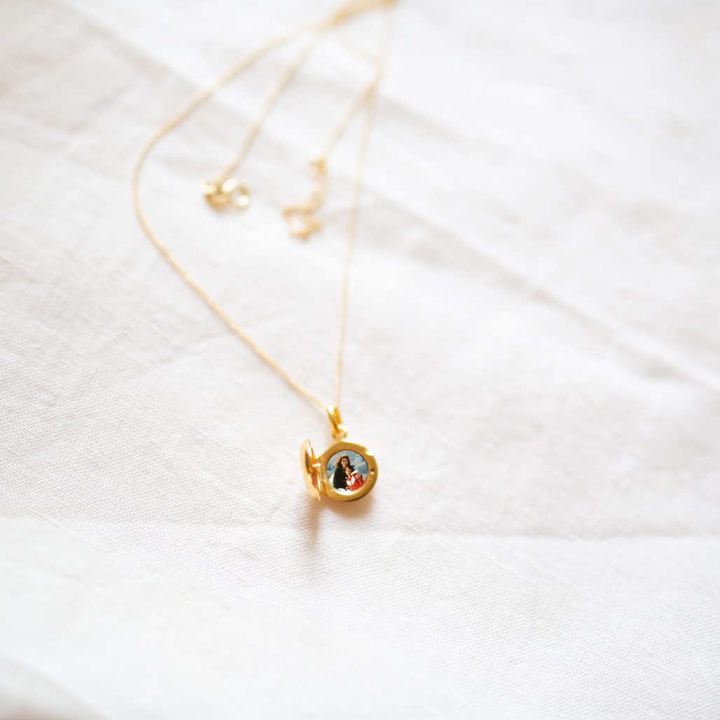 Tiny little gold locket with photo of her Mama - Locket Sisters