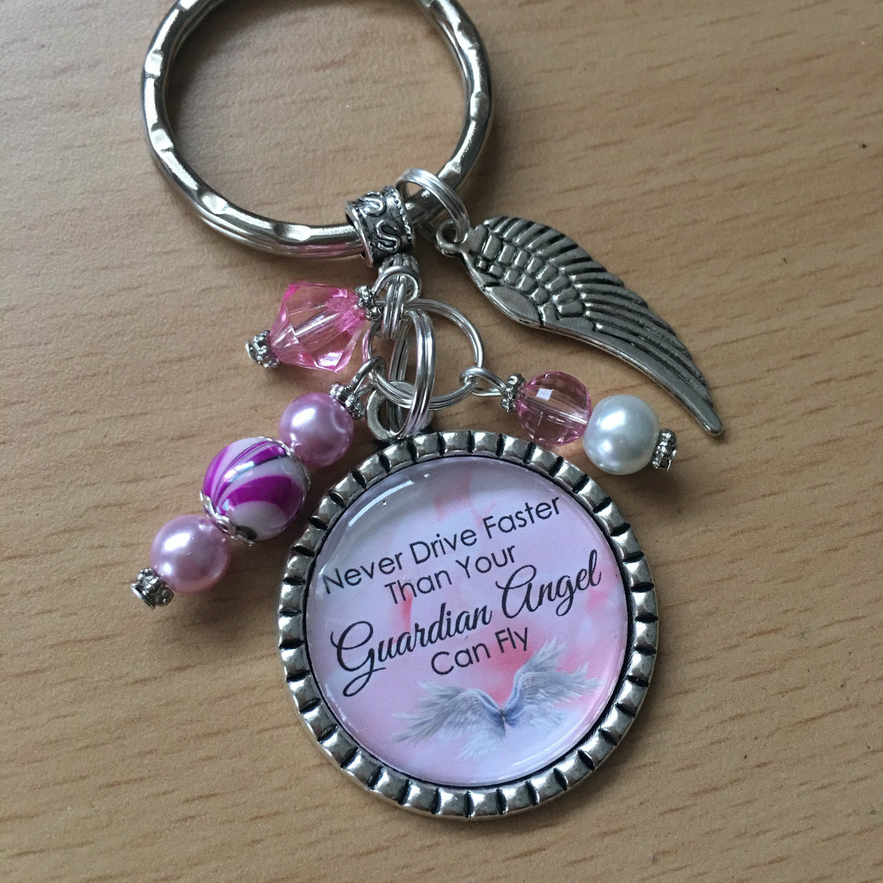 Never Drive Faster Than Your Guardian Angel Can Fly Keyring - Cleopatra ...