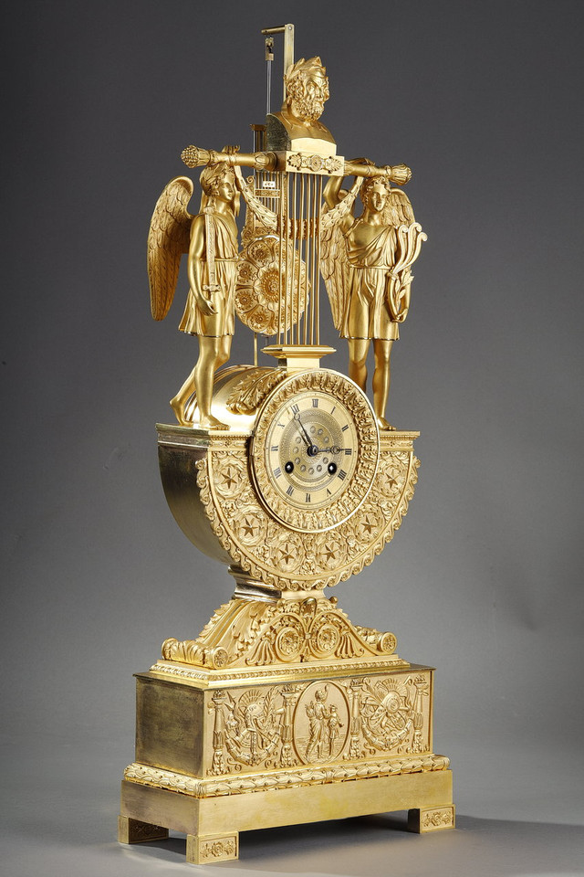 Beautiful chiseled bronze lyra-clock with a bust of Homer, Empire