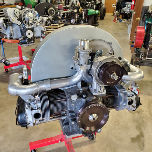 Single throttle body intake package with turbo plenums