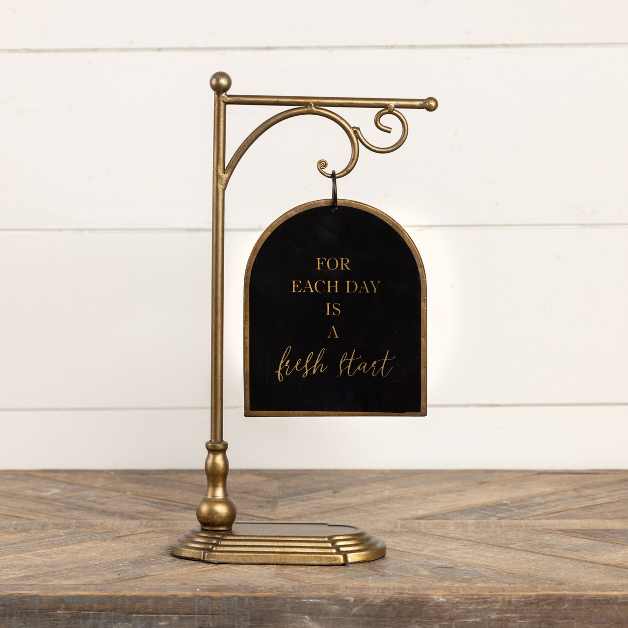 BLACK & GOLD HANGING SIGN ON STAND - Ragon House
