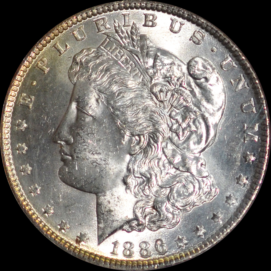 NGC MS63* 1886-P Morgan Dollar - Rainbow toning!!!