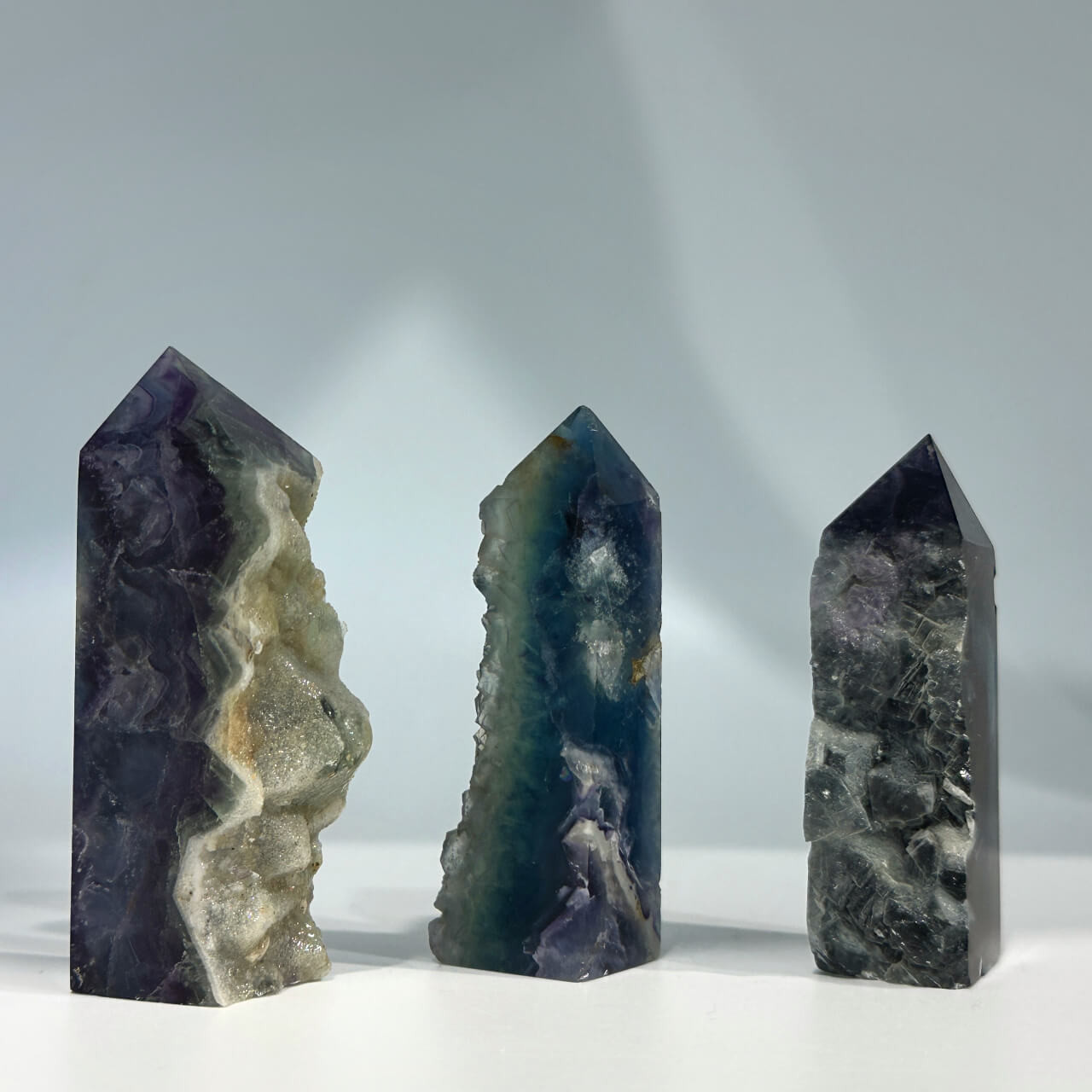 Half Rough Fluorite Point - Ice Imports