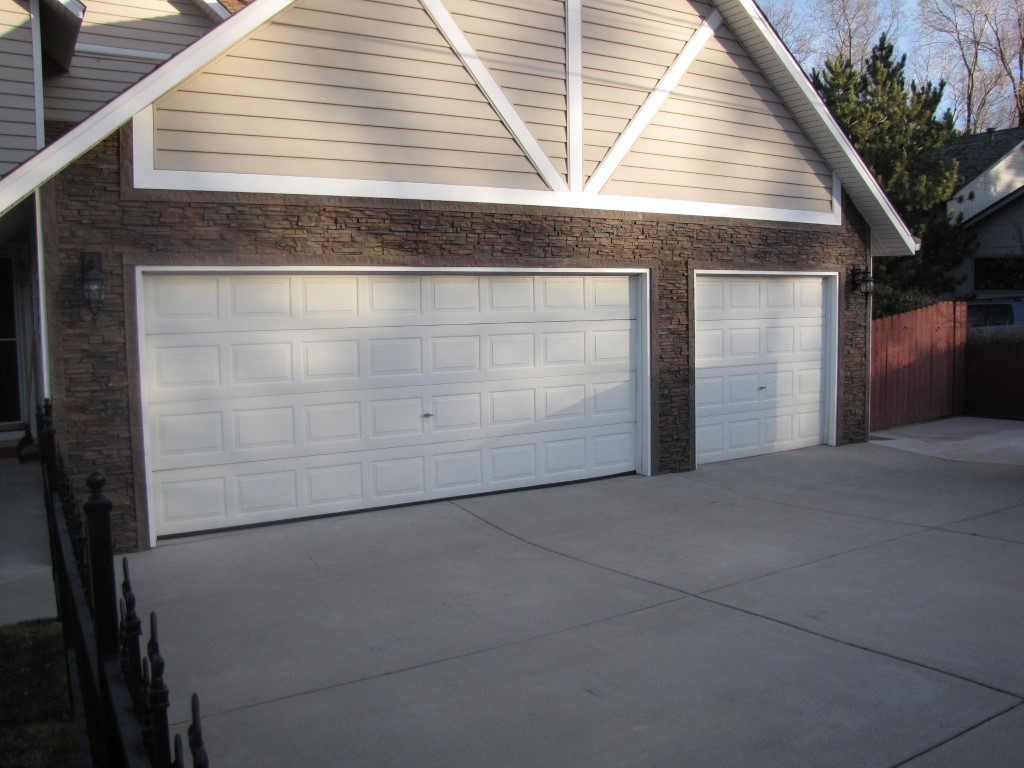 Garage Exterior Remodel with Panels and Trim - Barron Designs