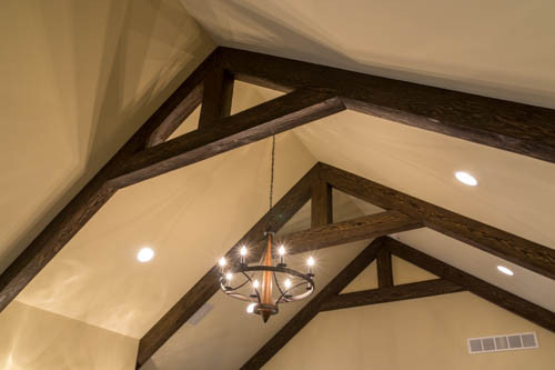 Great Room Ceiling Made Stunning with Trusses - Barron Designs