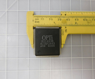 OPTi 82C493B Integrated Peripheral Controller (IPC) is a single-chip ...