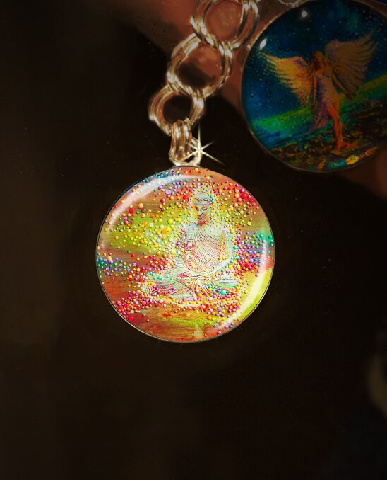 Buddha's Light Metaphysical Energy Charm