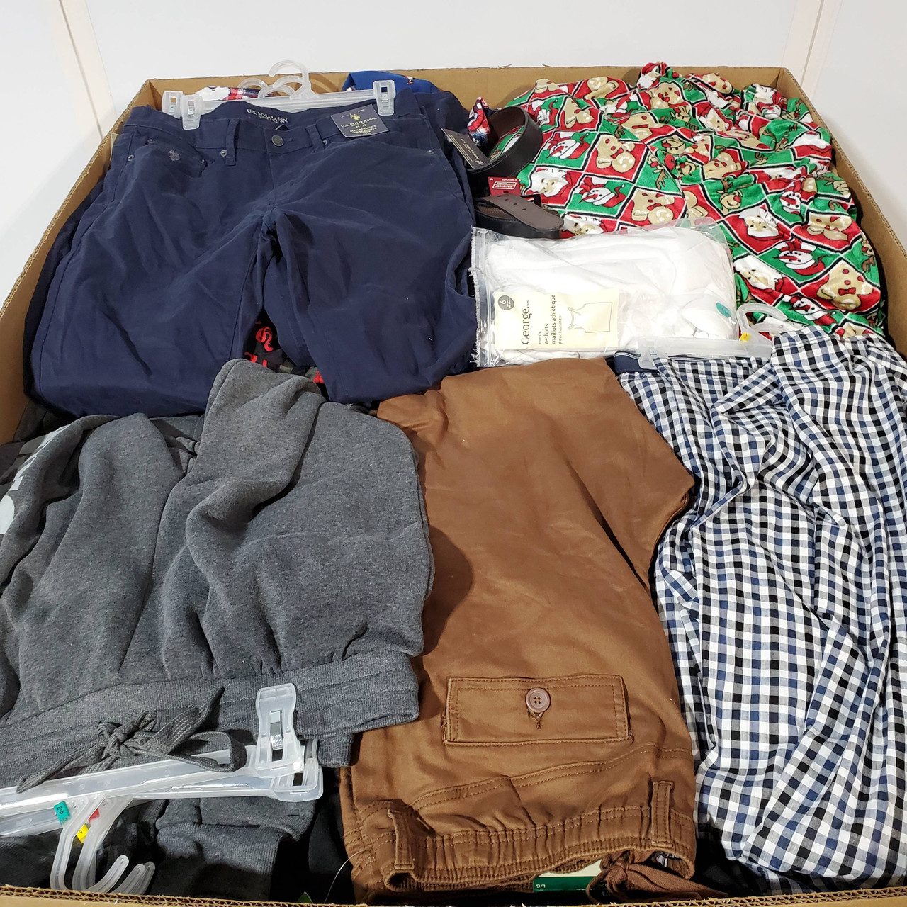 391 units of Men Clothing - MSRP $6,732 - Returns (Lot # 703813 ...