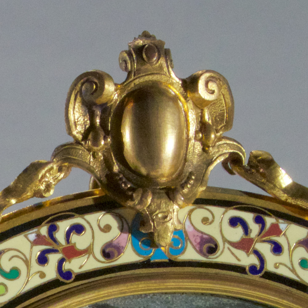 A Fine Champlevé Enamel and Gilt Bronze Vanity Mirror Held by Cherubs ...
