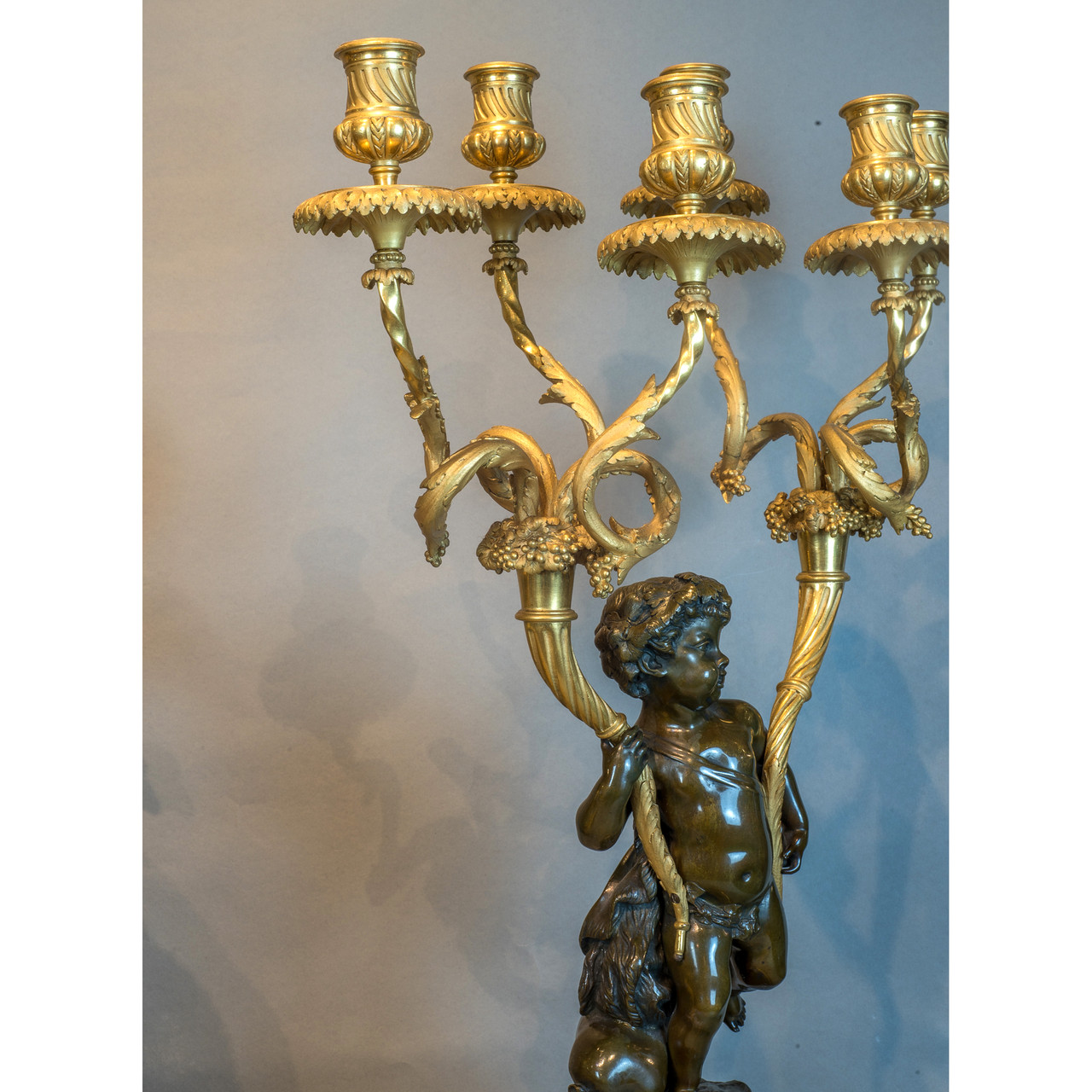 Antique French Patinated and Gilt Bronze Clock Set Garniture with Putto